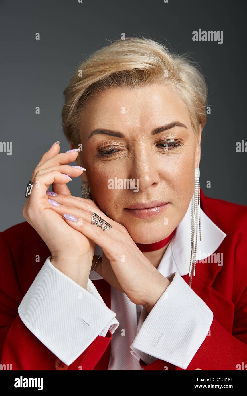 An adult stylish woman showcases elegance and poise while dressed in ...