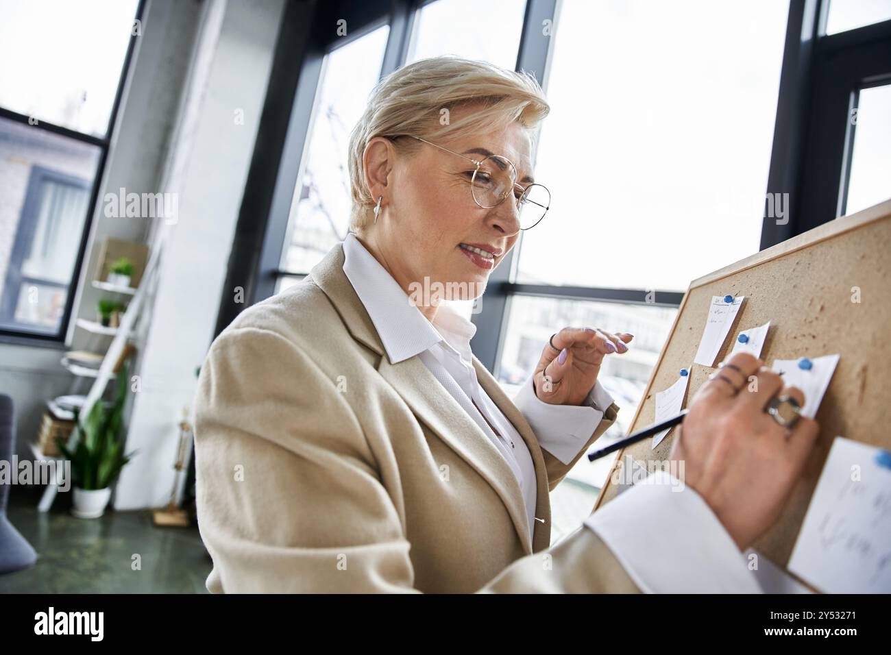 A sophisticated woman shares her innovative thoughts while engaged in a ...