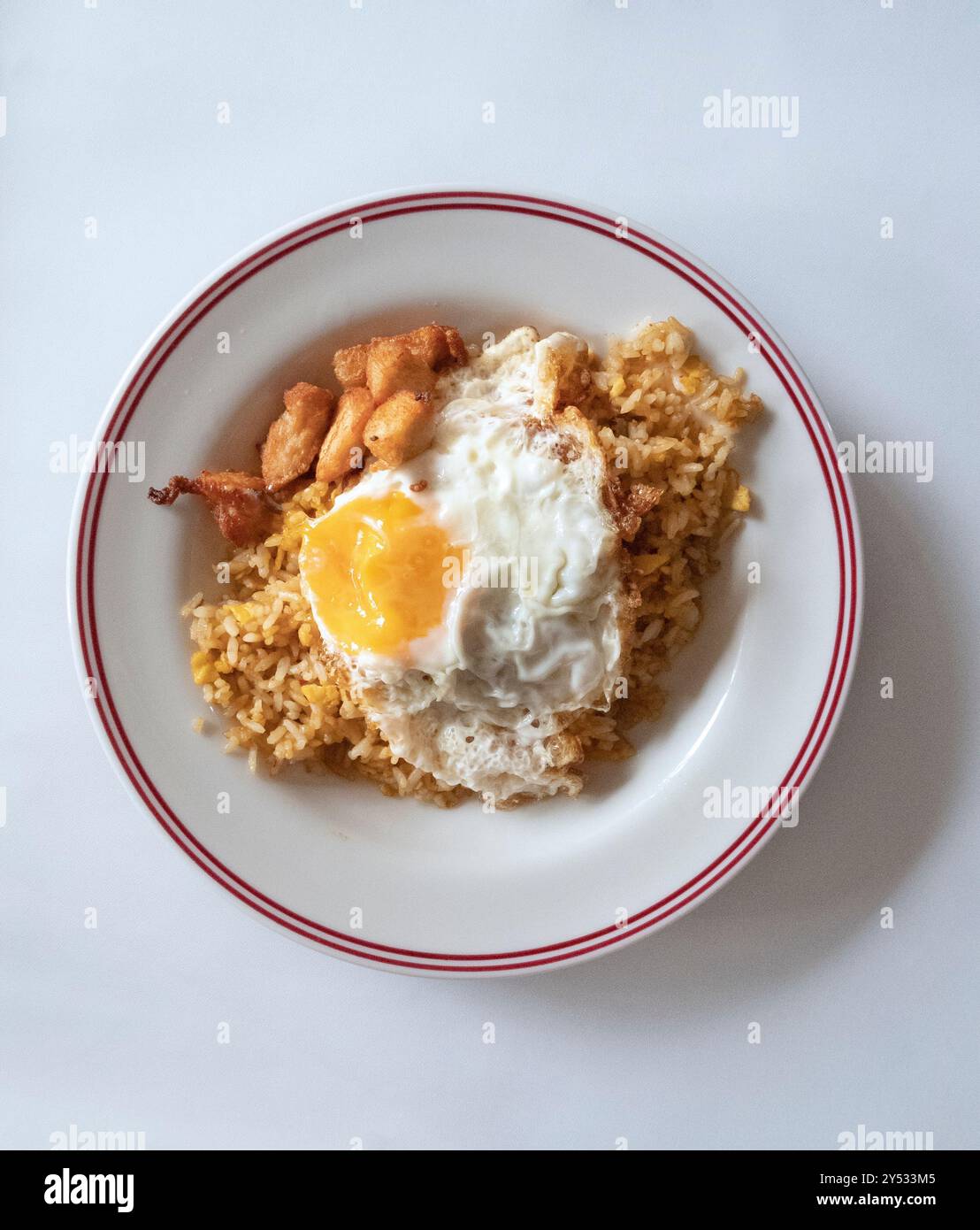 Kampung fried rice with beef egg topping Stock Photo - Alamy