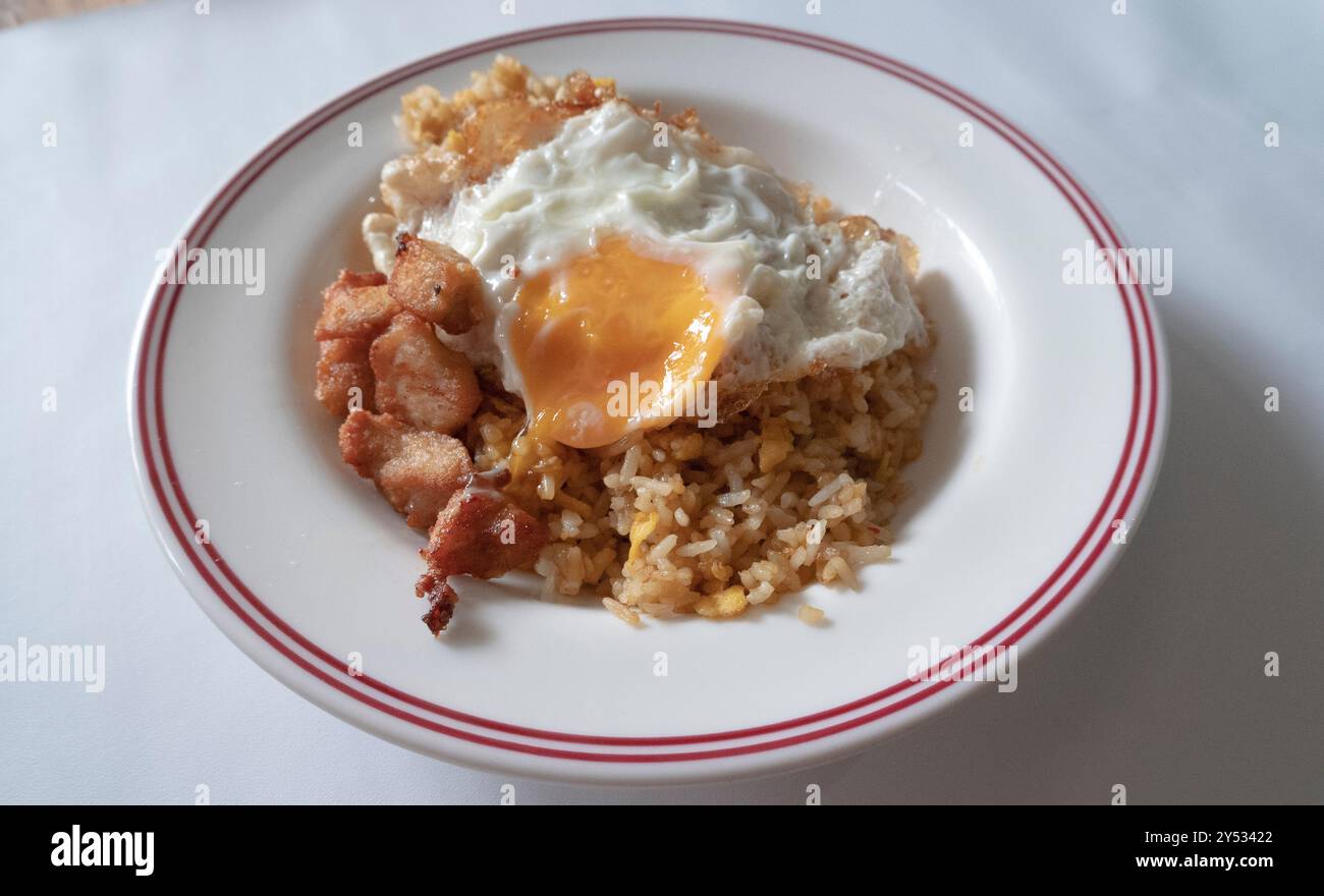 Kampung fried rice with beef egg topping Stock Photo - Alamy