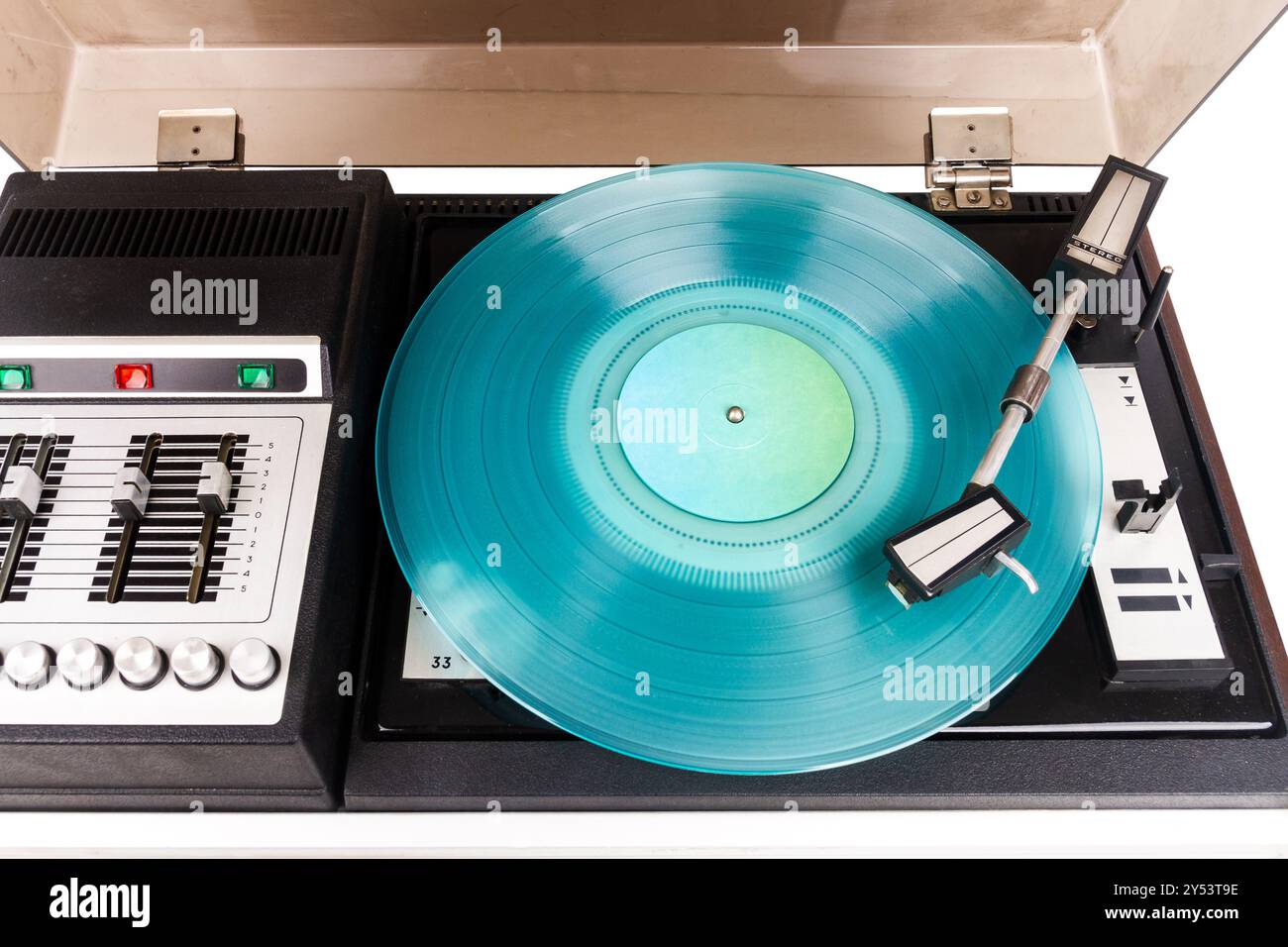 Close up of vintage turntable record player with cyan vinyl isolated on ...