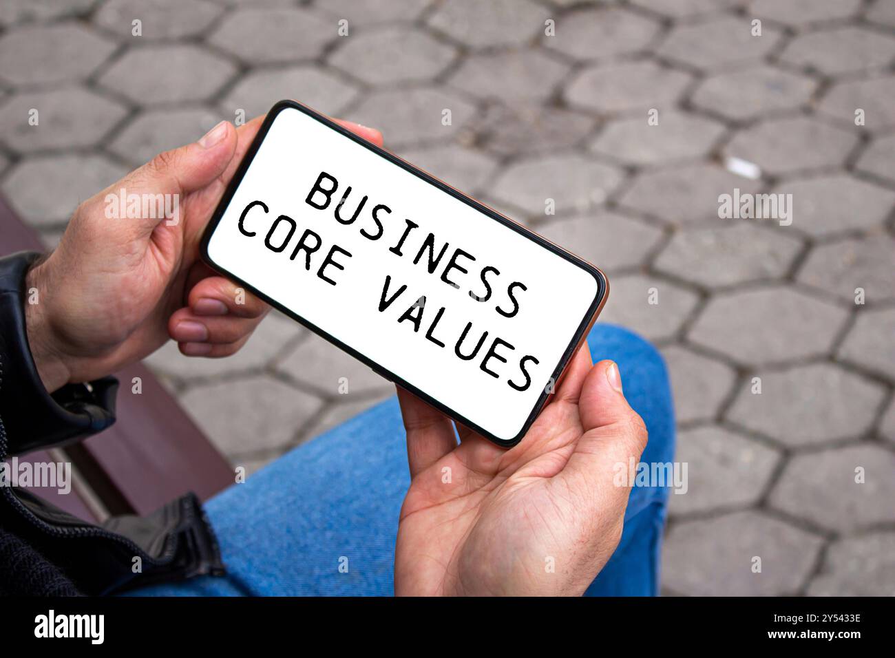 Business core values message written on smartphone screen. Conceptual ...
