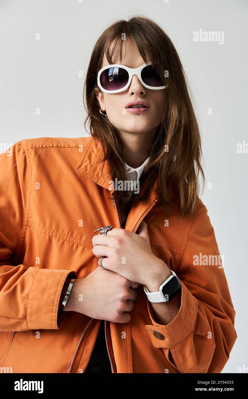 This young man showcases his unique fashion sense, blending modern ...