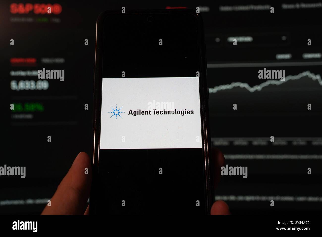 In this photo illustration, Agilent Technologies logo is displayed on a ...