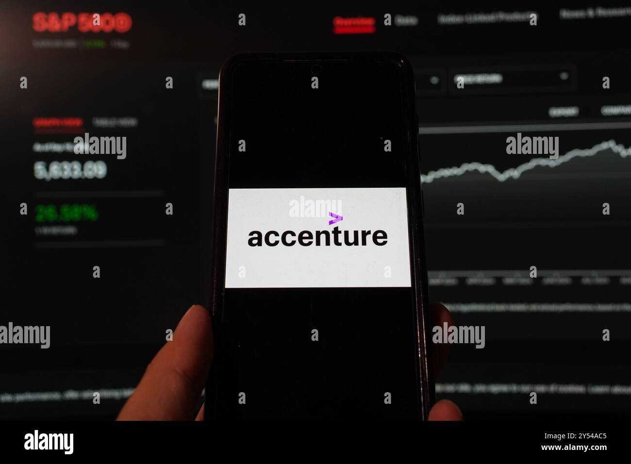 In this photo illustration, Accenture logo is displayed on a smartphone ...