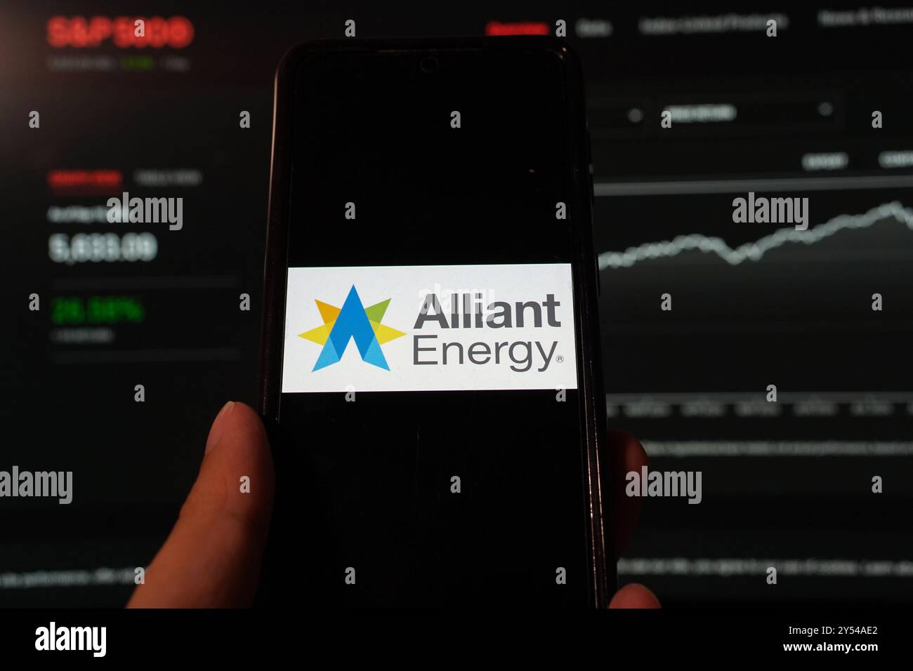 In this photo illustration, Alliant Energy logo is displayed on a ...