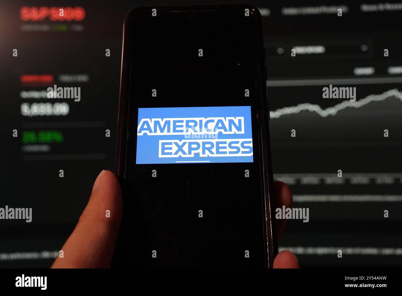 In this photo illustration, American Express logo is displayed on a ...