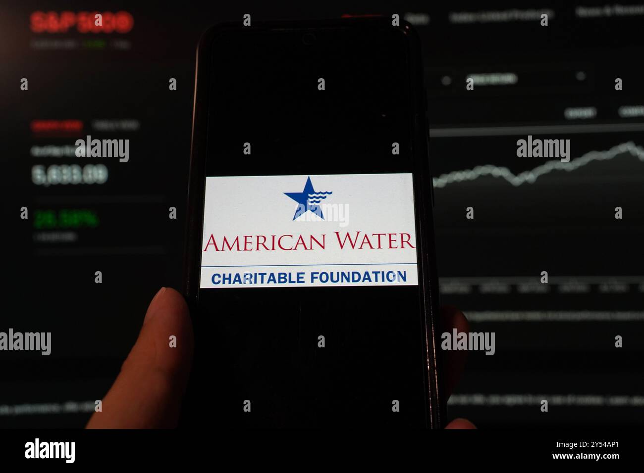 In this photo illustration, American Water Works logo is displayed on a ...