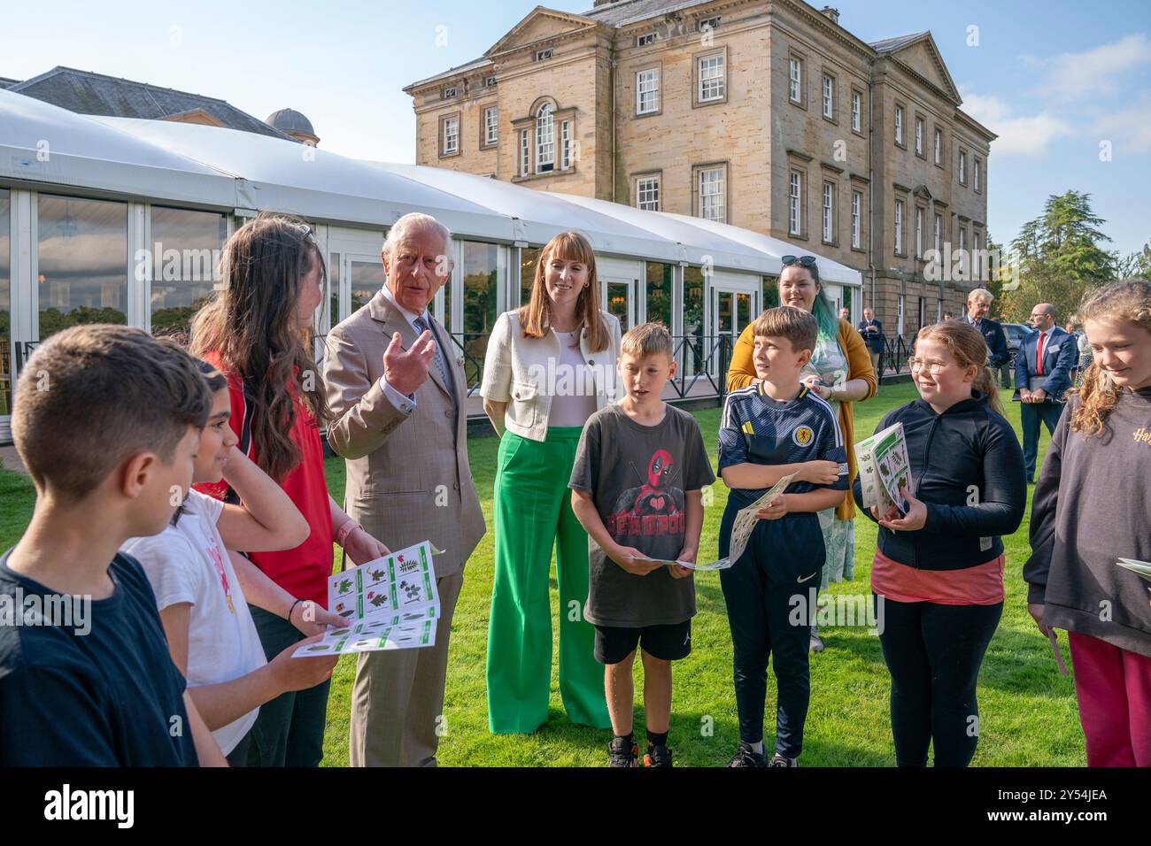 King Charles III, with Deputy Prime Minister Angela Rayner, meets staff ...
