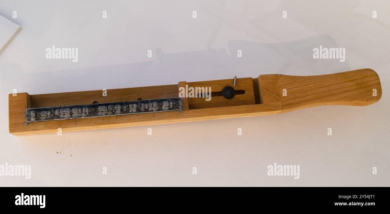 a typesetting device for setting text from lead letters Stock Photo - Alamy