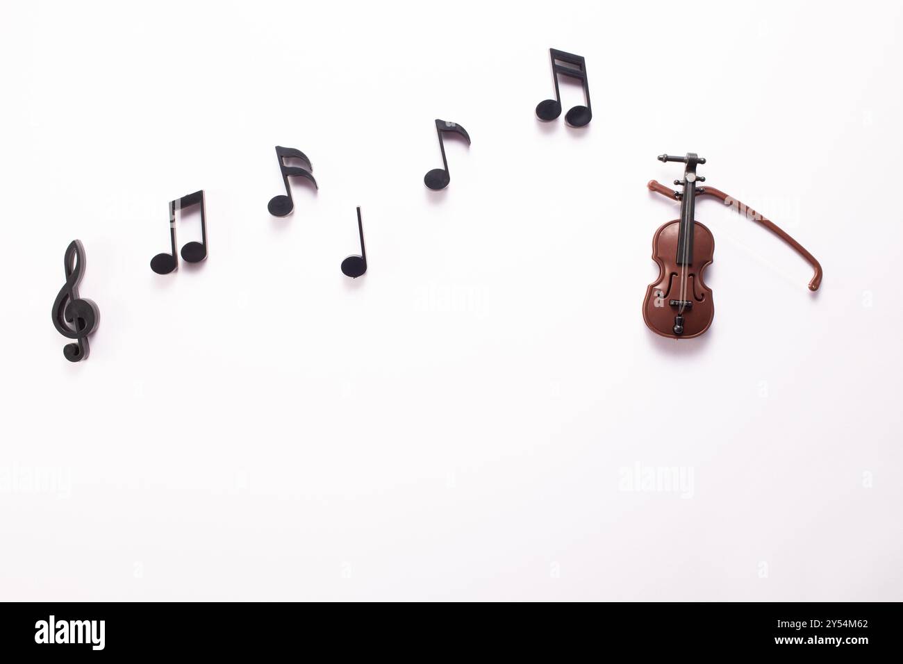 Music notes and violin on white background. International music day ...