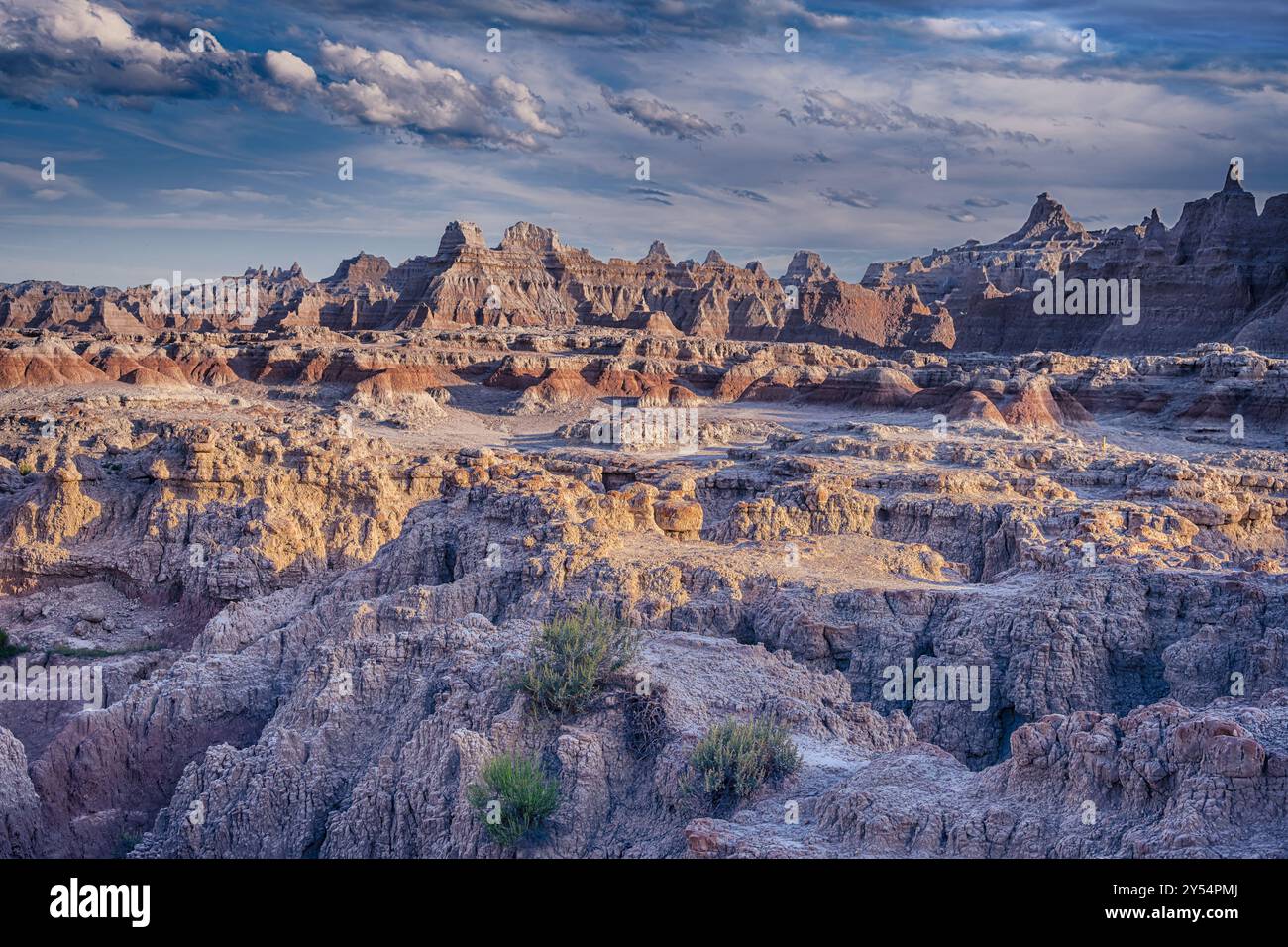 Light and shadows play over Door Trail, in Badlands National Park, near ...