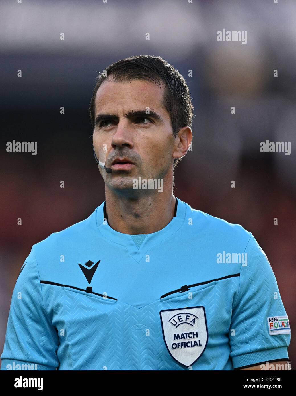 PRAGUE, CZECH REPUBLIC - SEPTEMBER 18: Slovenian Assistant referee Jure ...