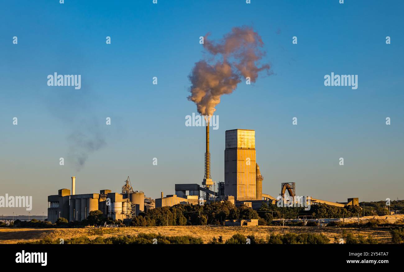 Dunbar cement works industrial structures with water vapour coming out ...