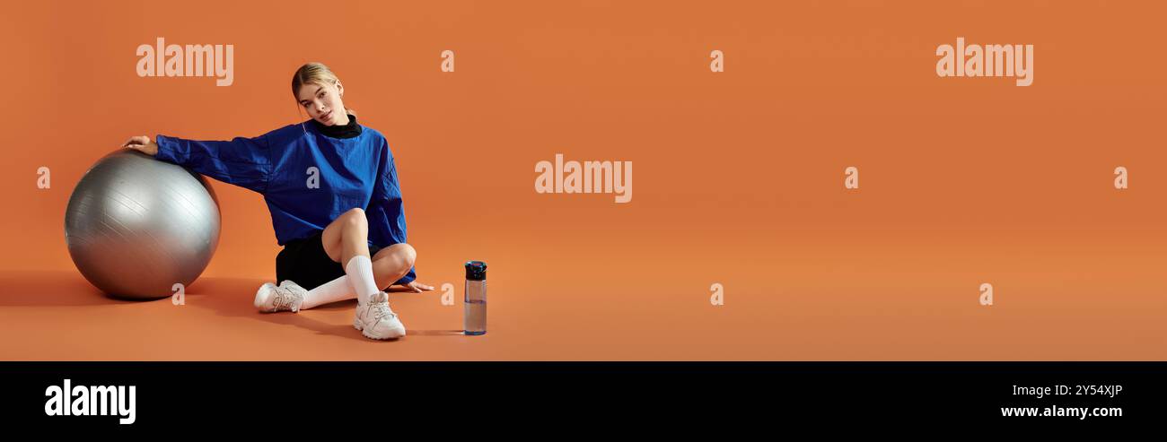 A talented athlete showcases a mix of strength and vulnerability beside ...