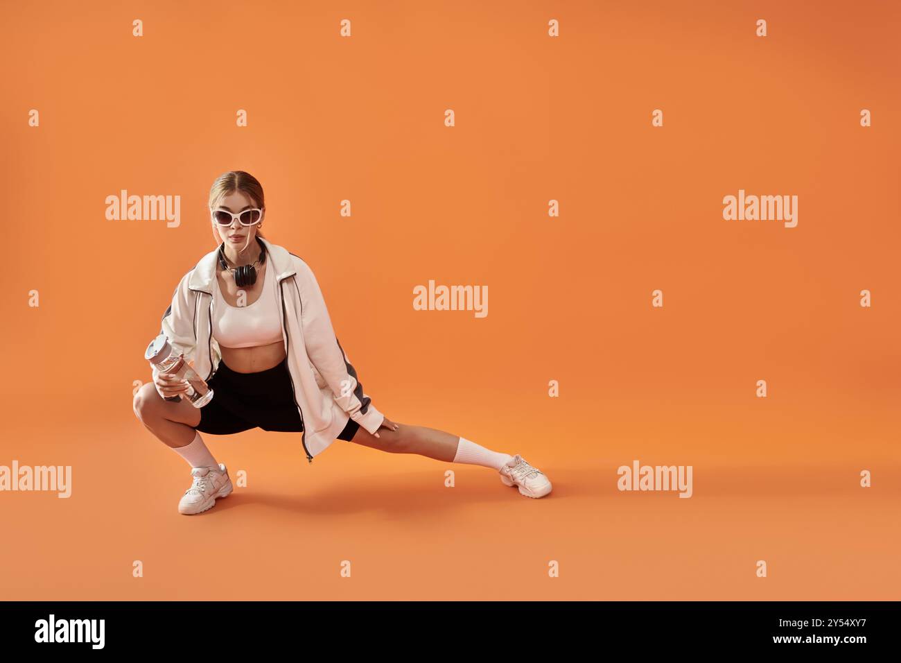 A talented athlete expresses her emotions while showcasing strength and ...