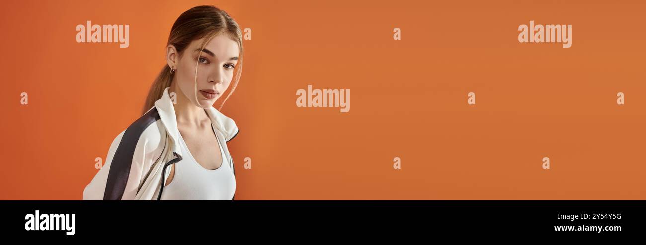 A dynamic athlete displays strength and emotions against a vibrant ...