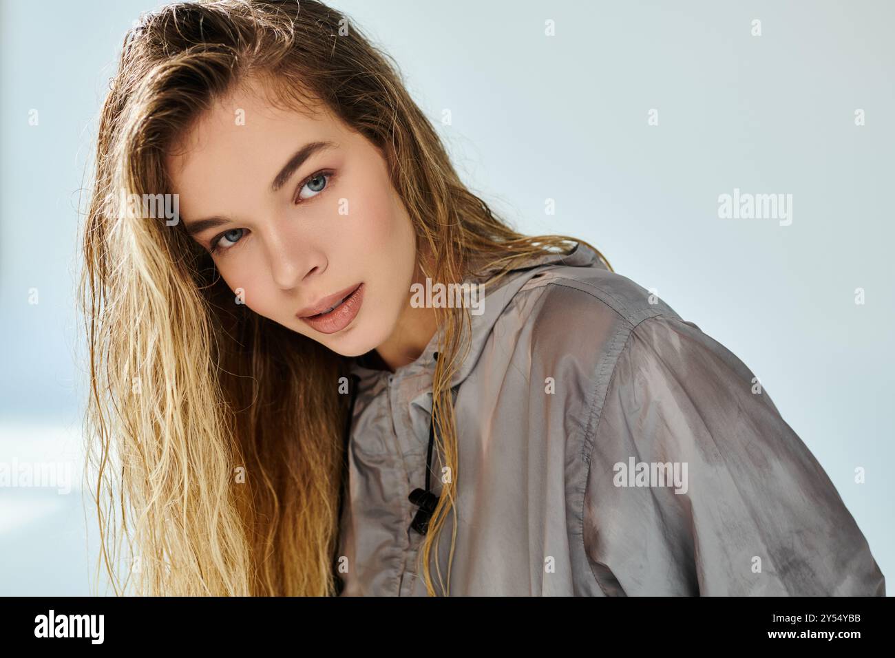 A talented sportswoman expresses deep emotions while posing gracefully ...