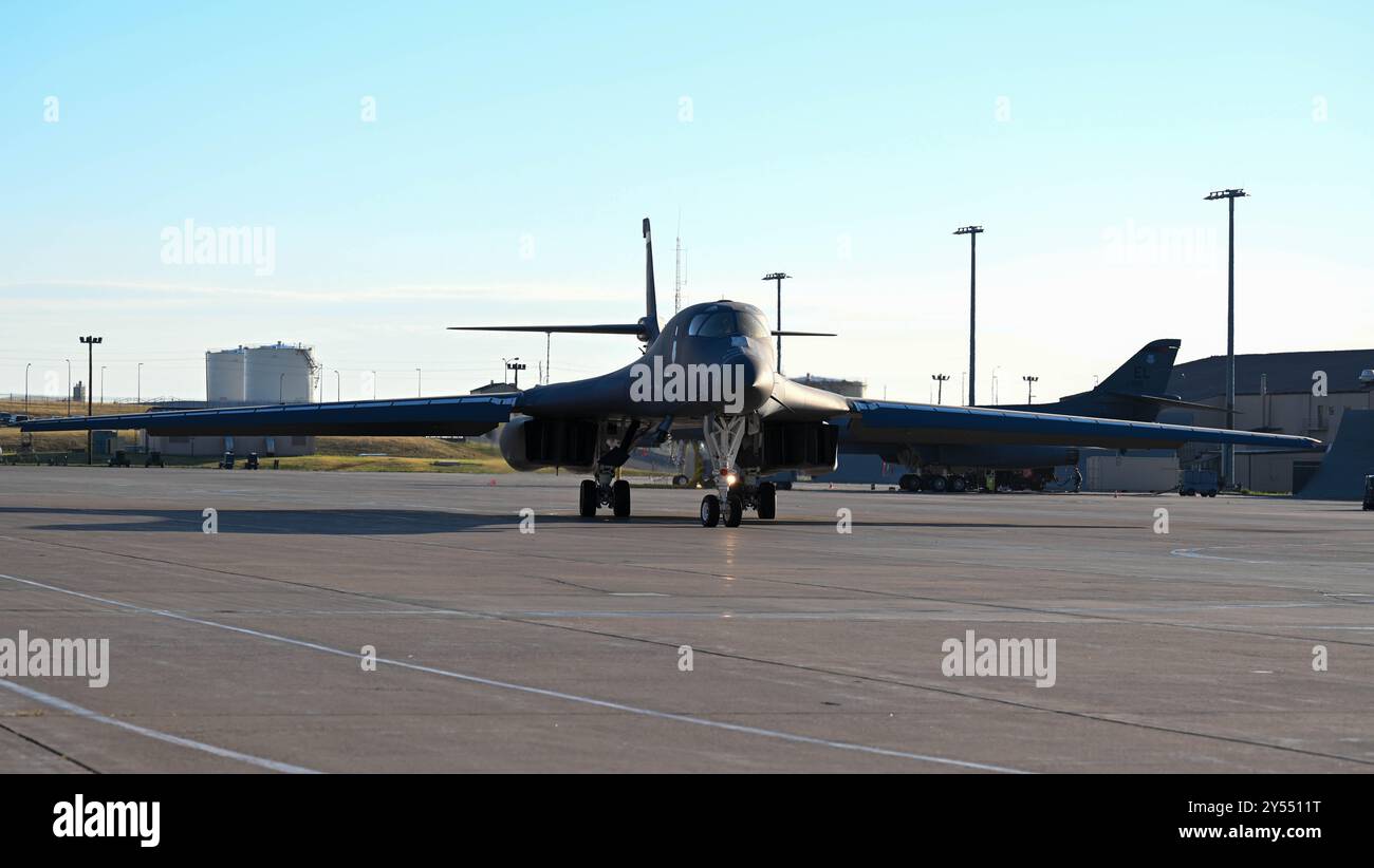 A B-1B Lancer attached to the 37th Bomb Squadron taxis onto the runway ...