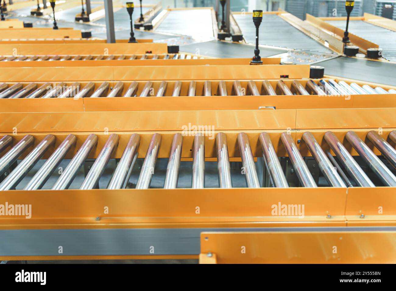 Modern conveyor delivery system in warehouse Stock Photo - Alamy