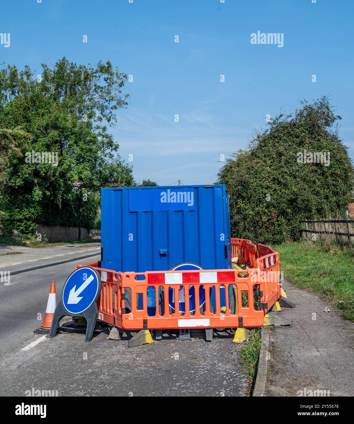 roadworks to repair, maintain or improve a road surface marked by red ...