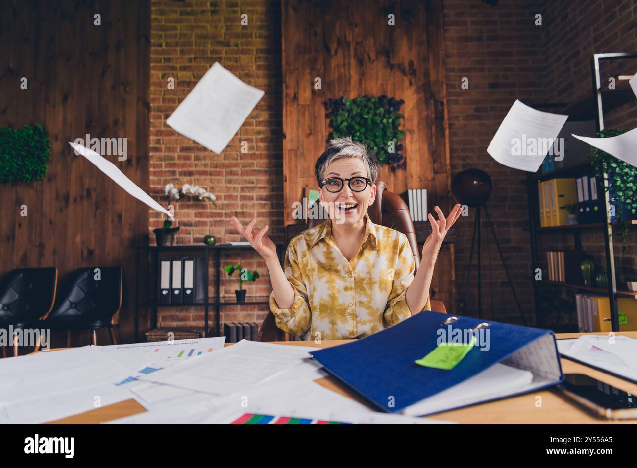 Photo of positive happy successful woman sitting armchair working as ...