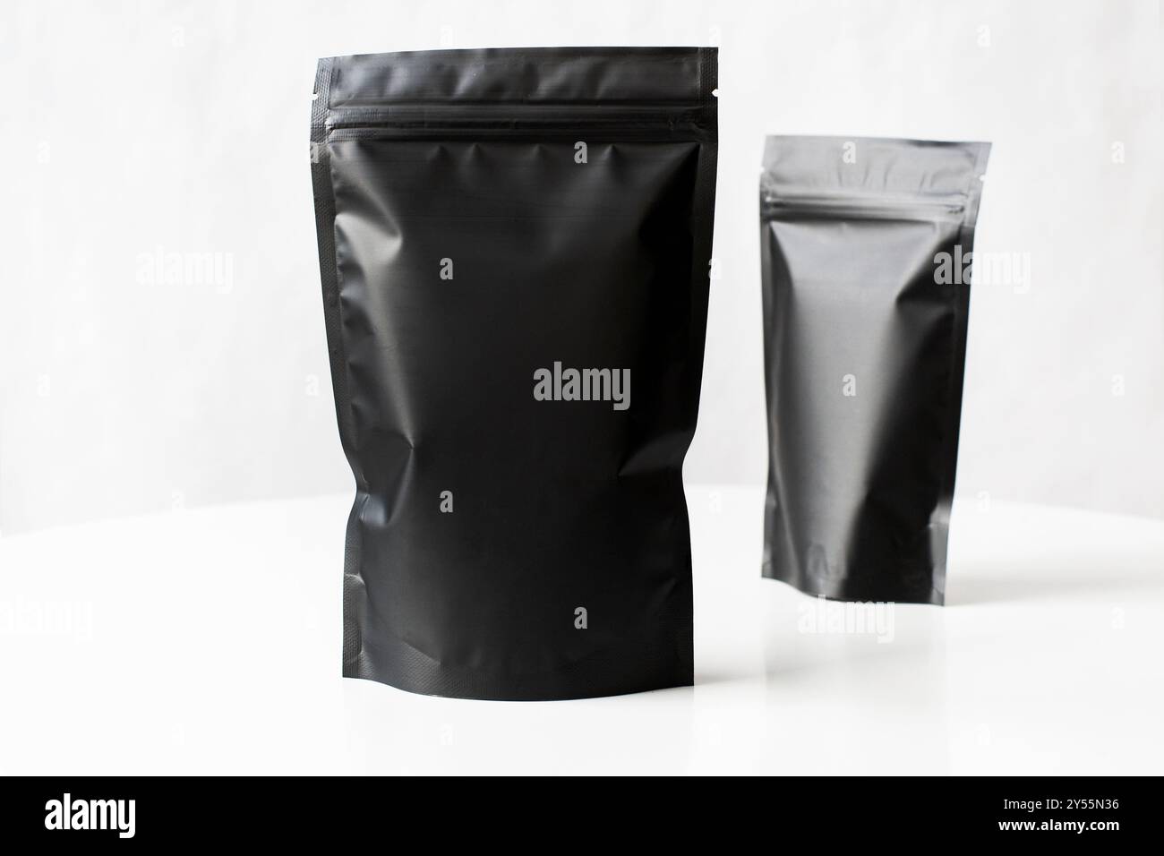 tea or coffee Black premium zip package mockup with the tea blend ...