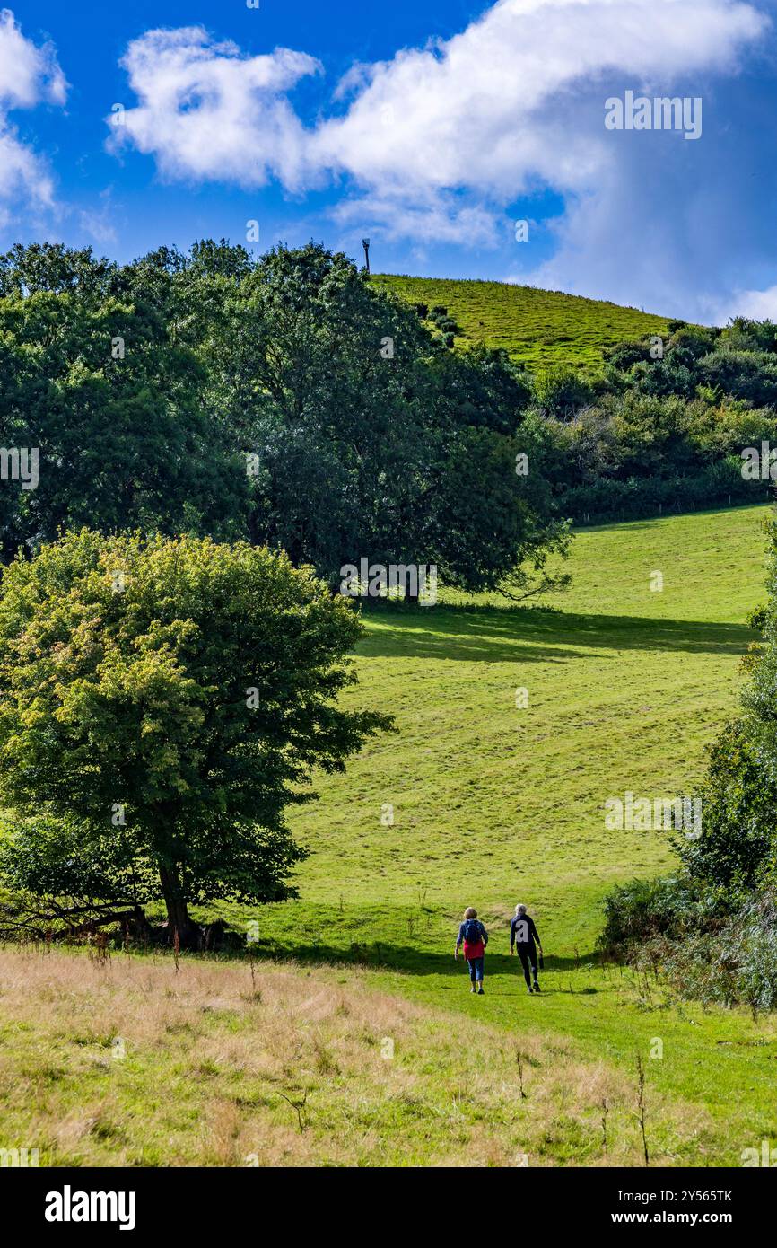 Two walkers on the Symondsbury Estate at the base of Colmer's Hill, nr ...