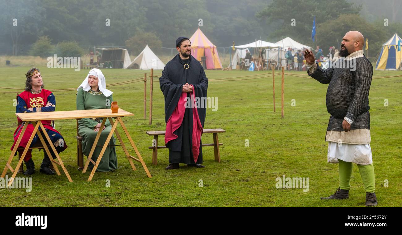 Re-enactors in Medieval costume play King Edward I & Bishop Anthony Bek ...