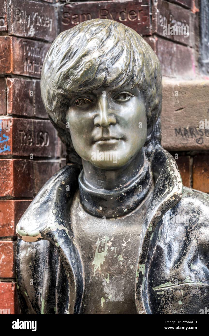 Statue of musician song writer John Lennon at the entrance to Liverpool ...