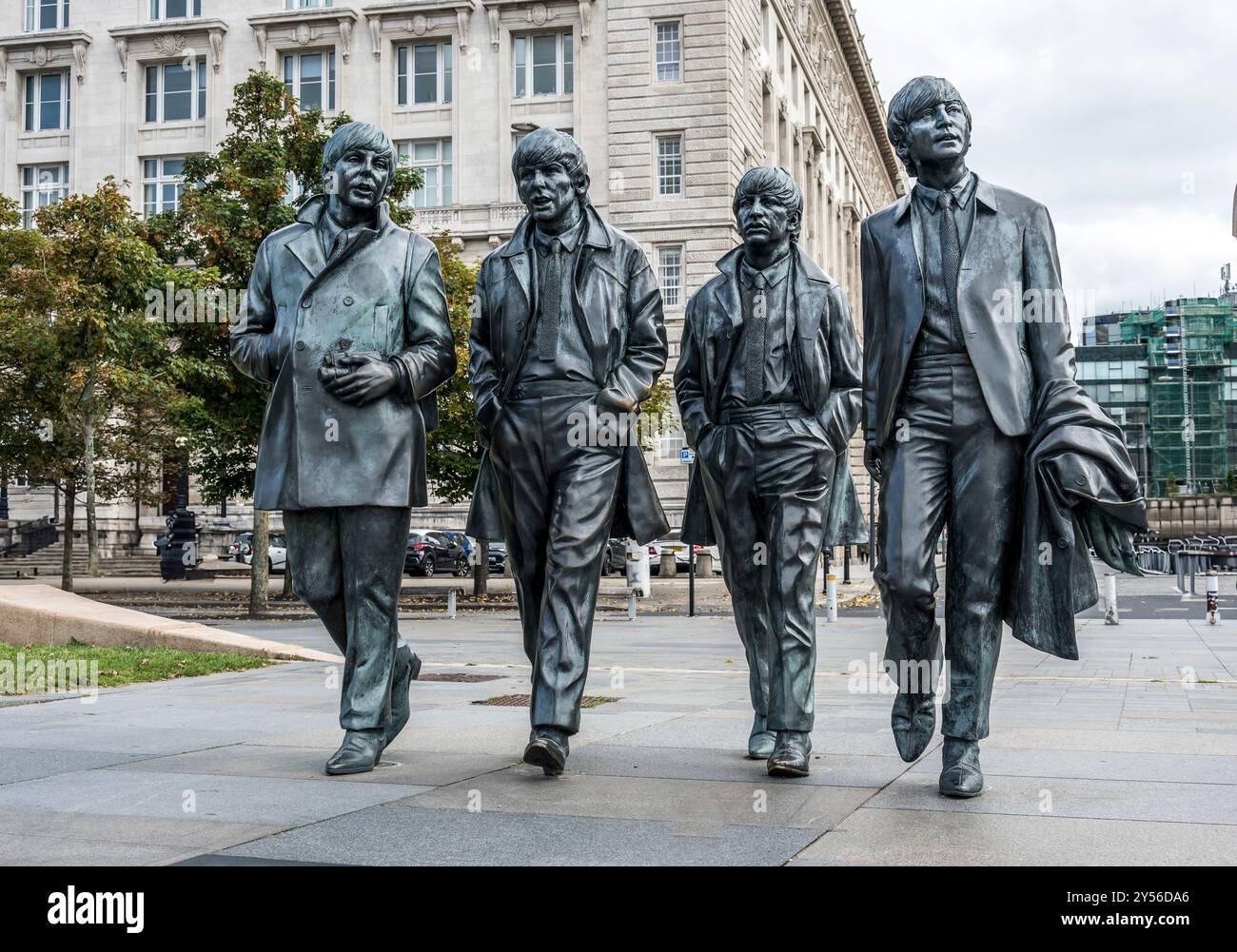 This image is the statue of the Liverpool music group the Beatles who ...