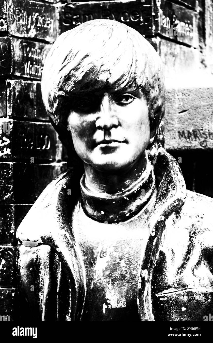Statue in black and white of musician song writer John Lennon at the ...