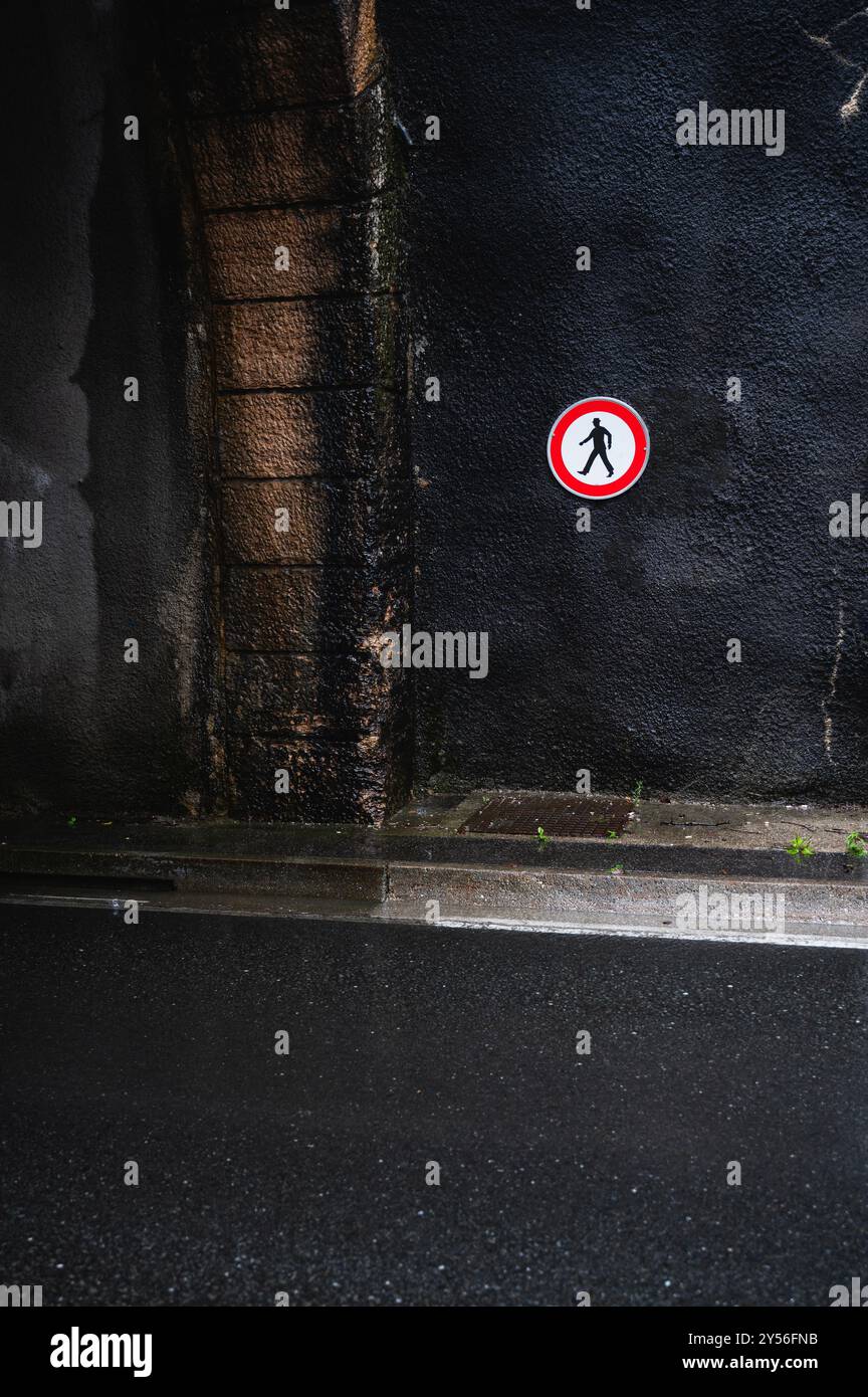 A Do not enter sign at the entrance to a tunnel. People Walk Forbidden ...