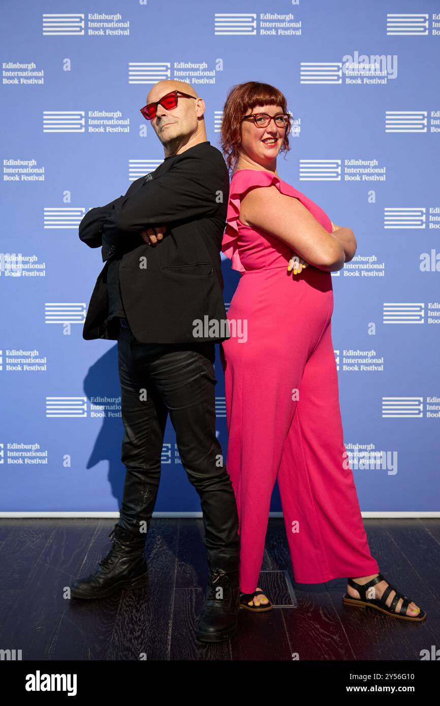 Scottish authors Grant Morrison and Jane Flett play up for the camera ...