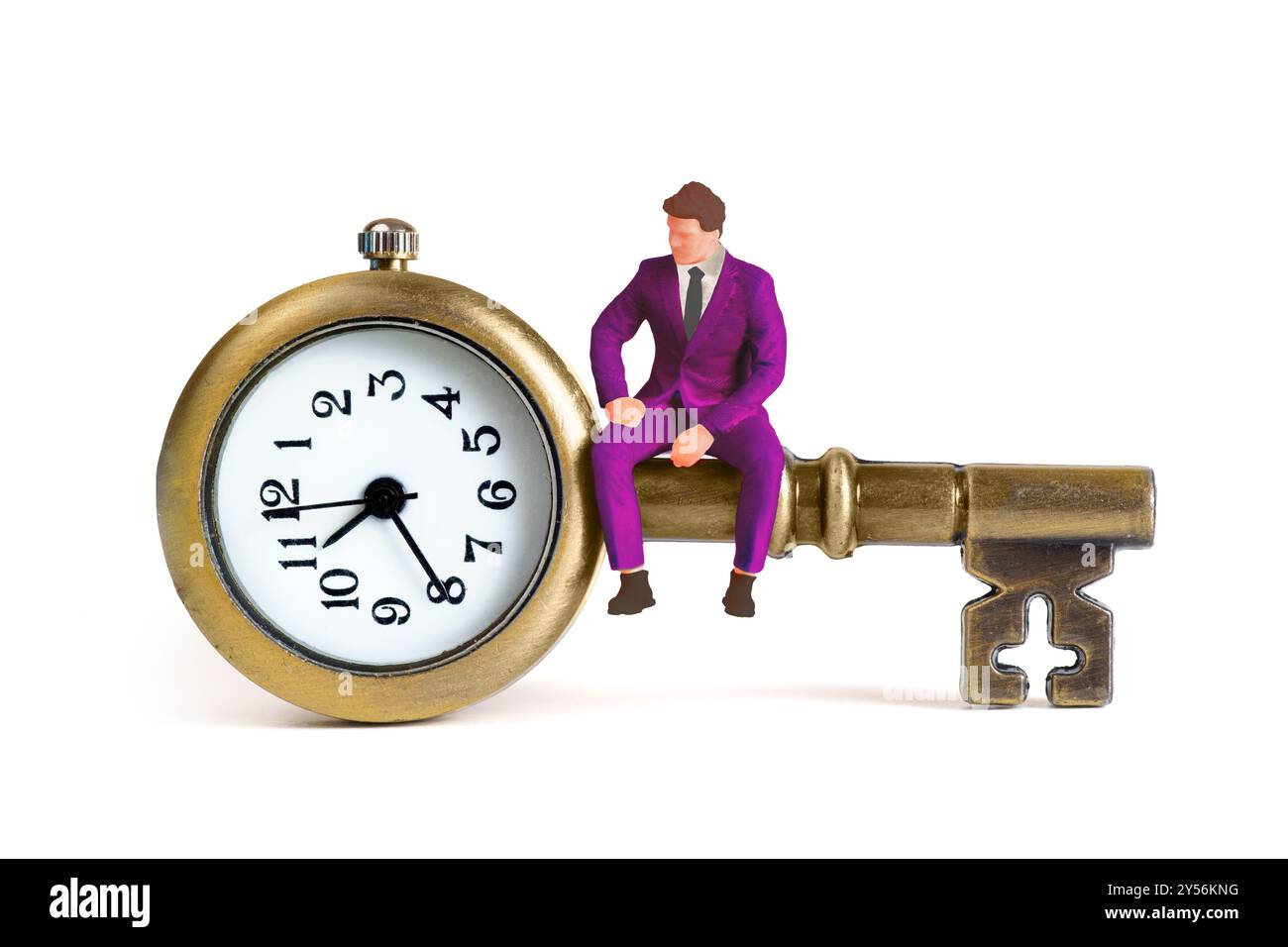 Time management and opportunity concept with a tiny businessman ...