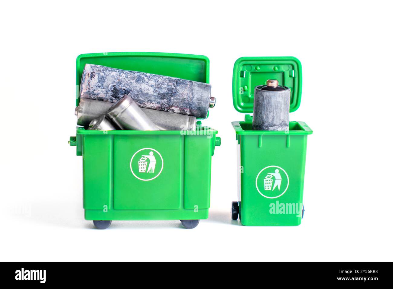 Miniature scene showcasing mixed batteries in green trash bins isolated ...