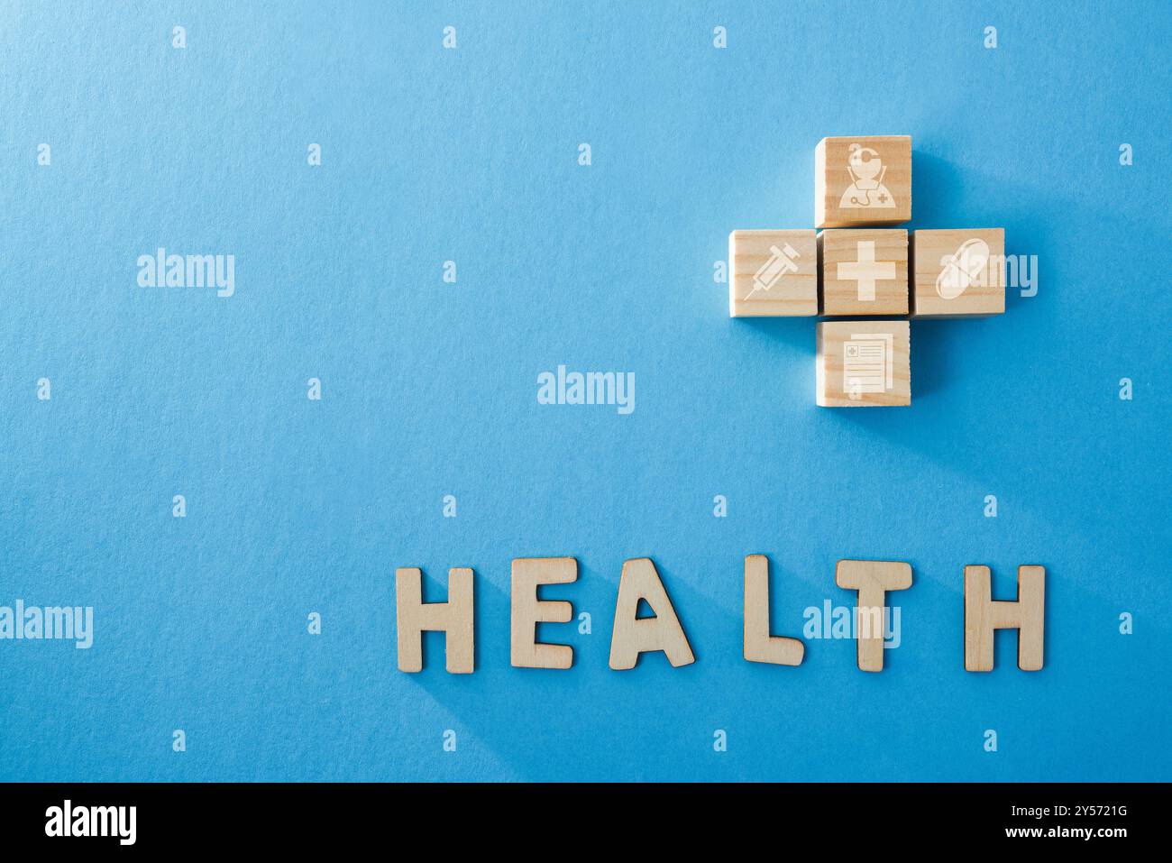 Health background formed with wooden blocks screen printed with medical ...