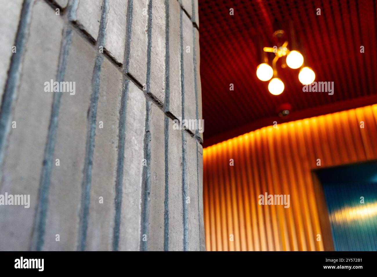 Concrete feature wall at the reception area interior of The Standard ...
