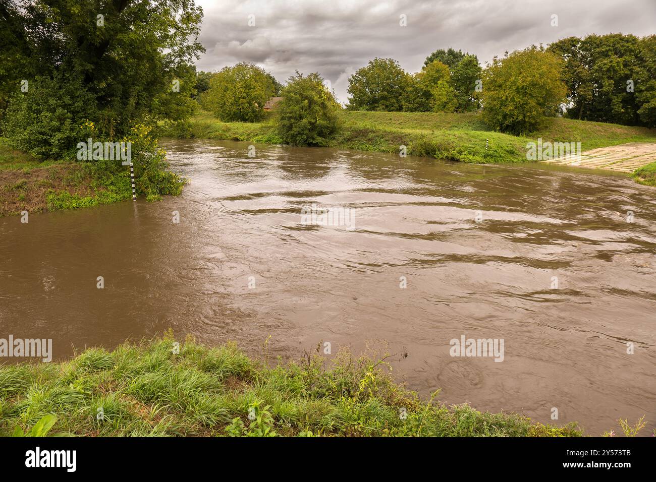 Flooding in mild weather zone. Climate change concept. High water level ...