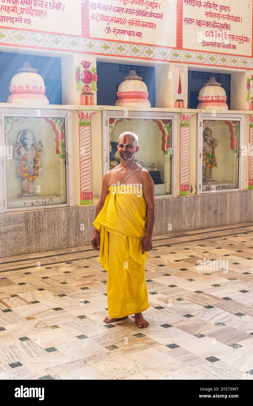 Pushkar, Rajasthan, India. November 6, 2022. Monk in yellow robes in a ...