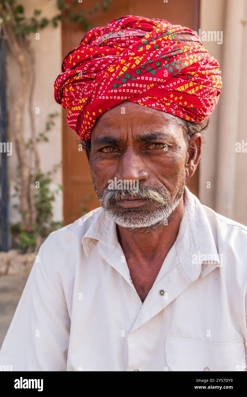 Killa, Degana, Rajasthan, India. November 9, 2022. Man in a red turban ...