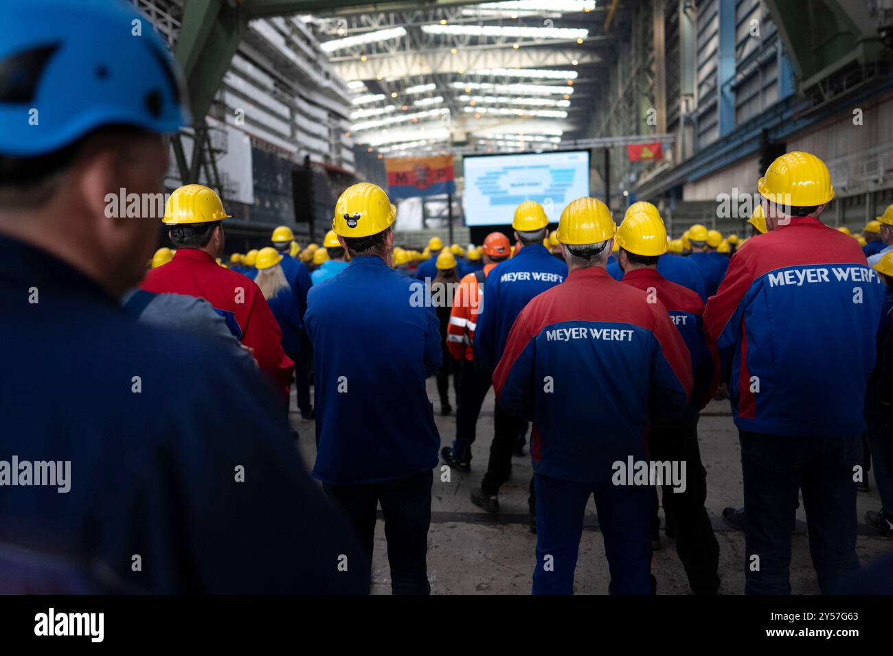 Workers at the Meyer Werft shipyard in Emden at a works meeting in ...