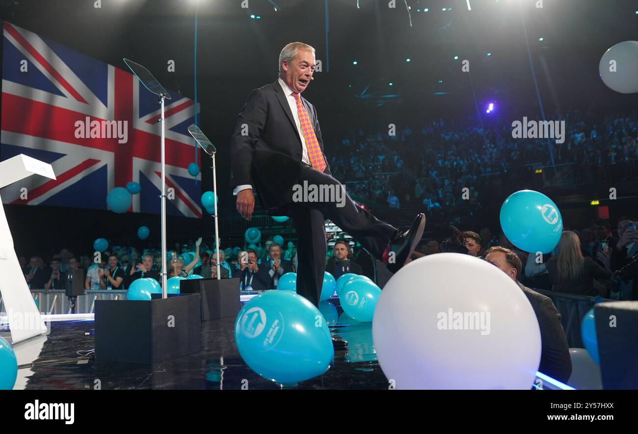Reform UK leader Nigel Farage speaking during the party's annual ...
