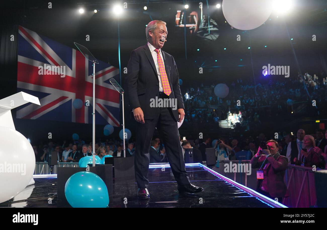 Reform UK leader Nigel Farage speaking during the party's annual ...