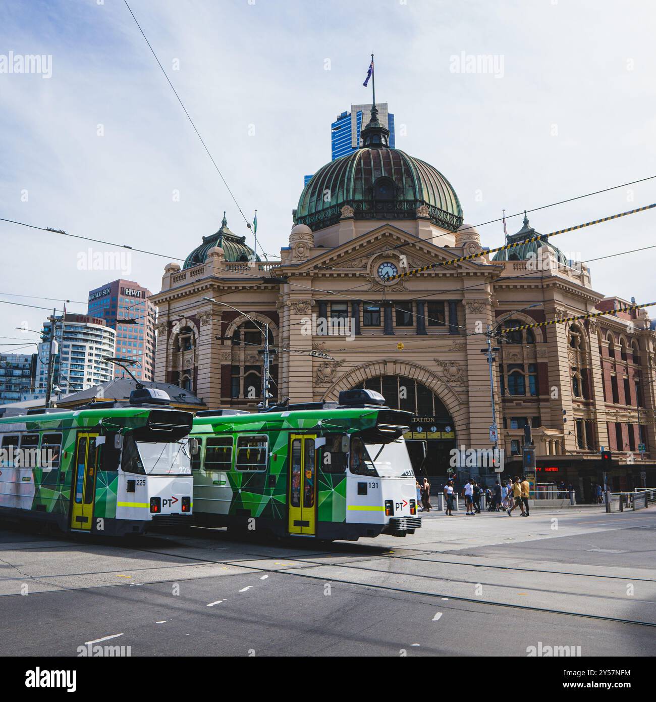 Melbourne, Australia - January 10 2021: Two iconic Melbourne trams pass ...