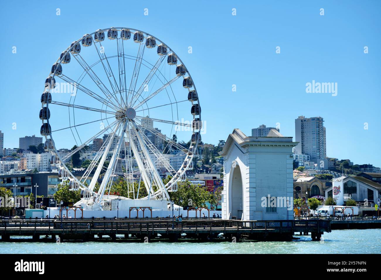 The SkyStar Ferris Wheel at Fisherman’s Wharf with The Ferry Arch and ...