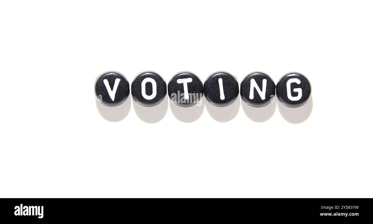 Black and white voting concept with word formed by letter blocks on ...