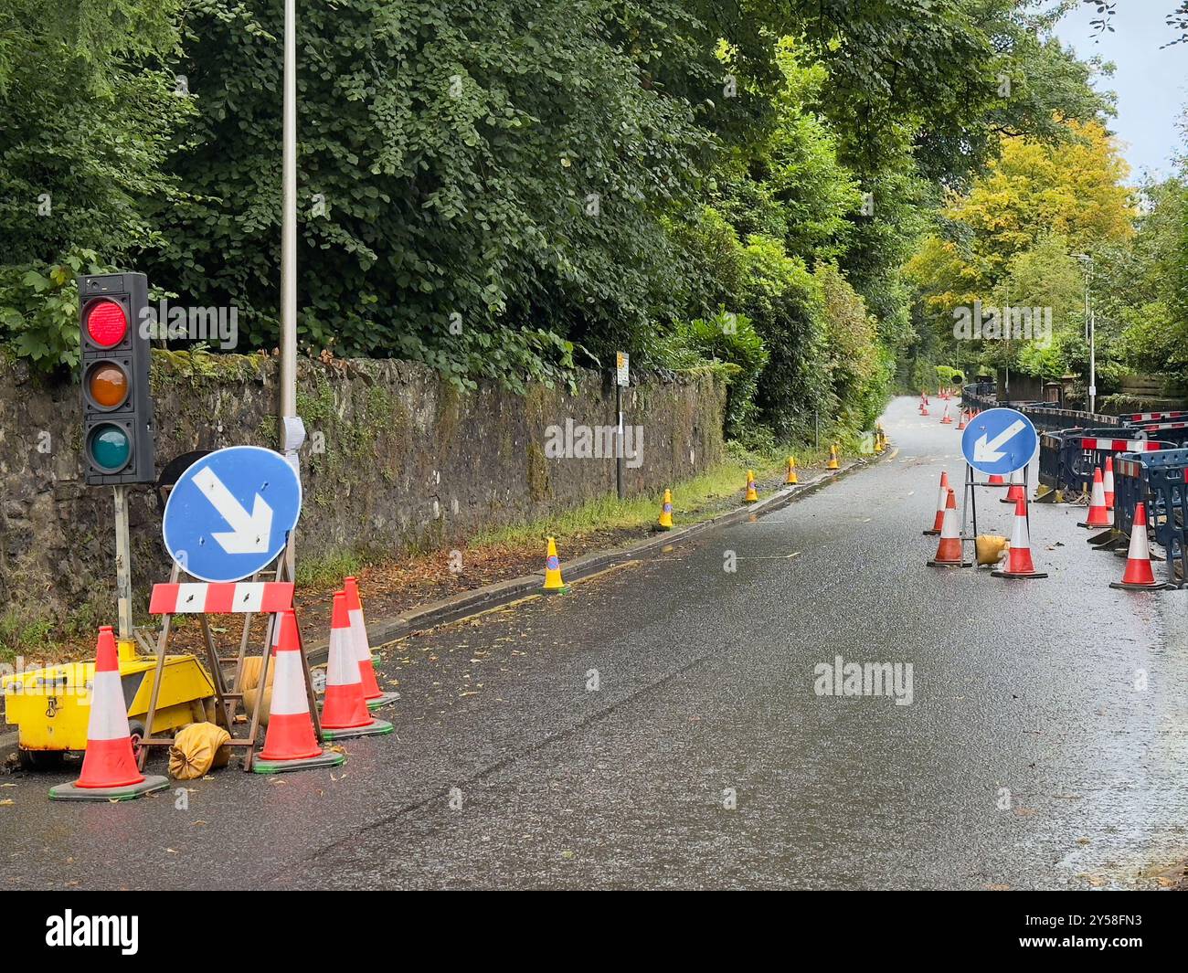 Road ahead closed sign and traffic cones Stock Photo - Alamy