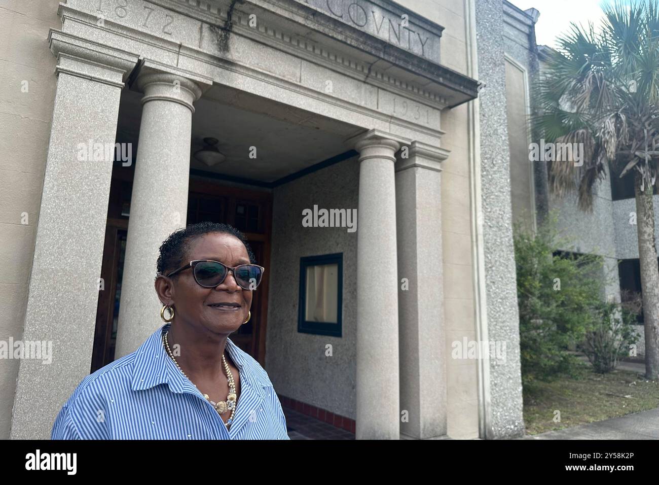 Yvonne Grovner, a resident of Sapelo Island, stands outside the ...