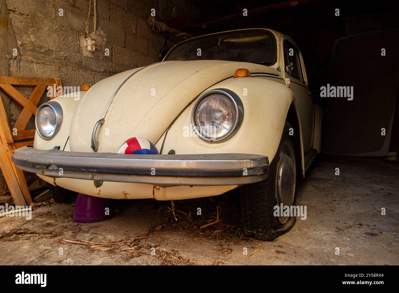 A beautiful old unused VW beetle in a garage Stock Photo - Alamy